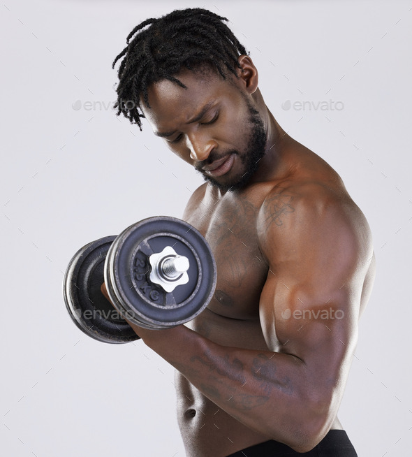 Fitness training, dumbbell exercise and black man in studio for fitness ...