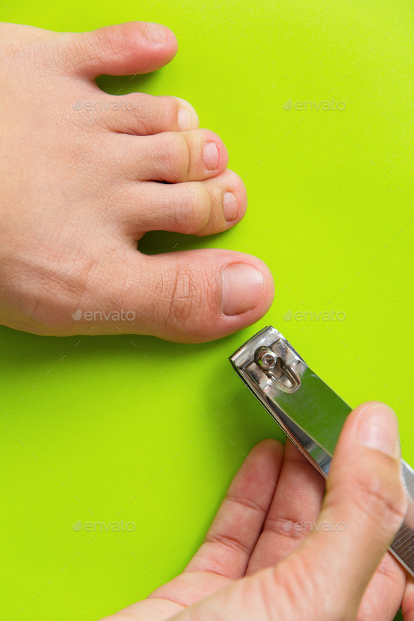 Cutting your toenails Stock Photo by osbmxhouse | PhotoDune