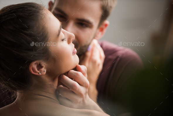 tender man touching face ow beloved girlfriend with closed eyes on ...