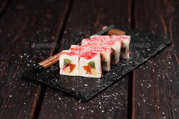 Asian sweet dessert maki sushi - Roll with fruits and cream cheese with ...