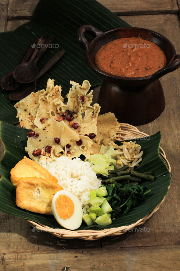 Nasi Pecel. Traditional Javanese Rice Dish of Steamed Rice with ...