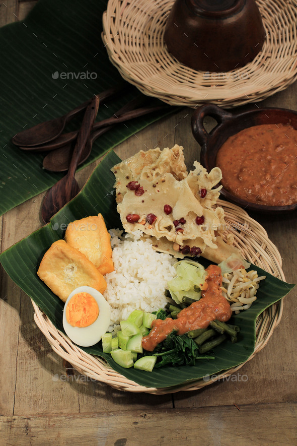 Nasi Pecel. Traditional Javanese Rice Dish of Steamed Rice with ...