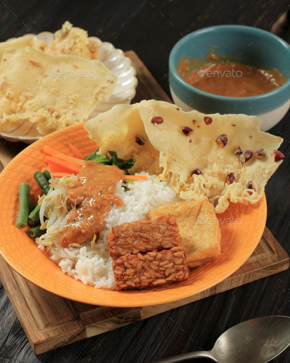 Nasi Pecel, Indonesian Traditional Menu with Spicy Peanut SAuce, Tempeh ...