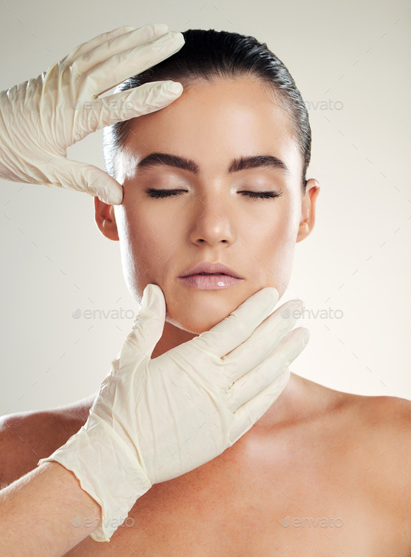 Botox, beauty and plastic surgery with hands on woman face for ...