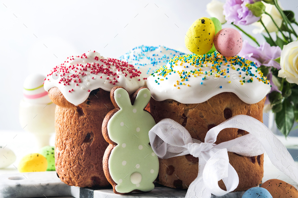 Traditional Easter sweet bread or cakes with white icing and sugar ...