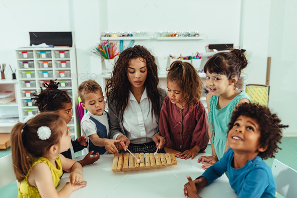 Learning teamwork through play Stock Photo by bernardbodo | PhotoDune
