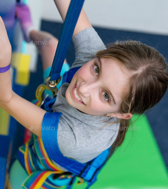 Portrait of teen girl on the climbing wall Stock Photo by tan4ikk ...