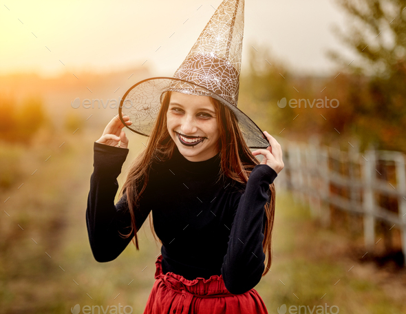 Portrait of teenage girl in witch hat Stock Photo by tan4ikk | PhotoDune