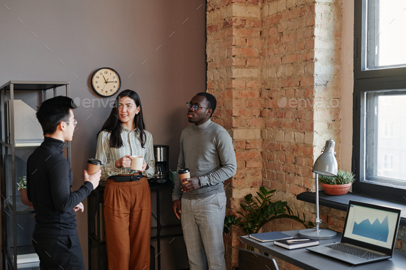 Three Co-workers Having Coffee Break Stock Photo by Media_photos ...