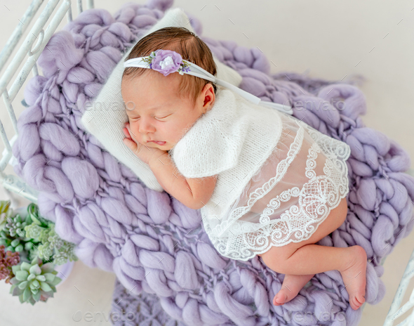 newborn baby girl sleeping in a little bed Stock Photo by tan4ikk | PhotoDune