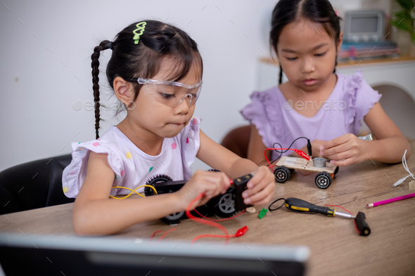 Asia students learn at home in coding robot cars and electronic board ...