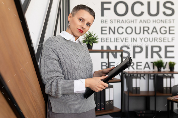 Business woman insurance agent leather folder for documents on office ...