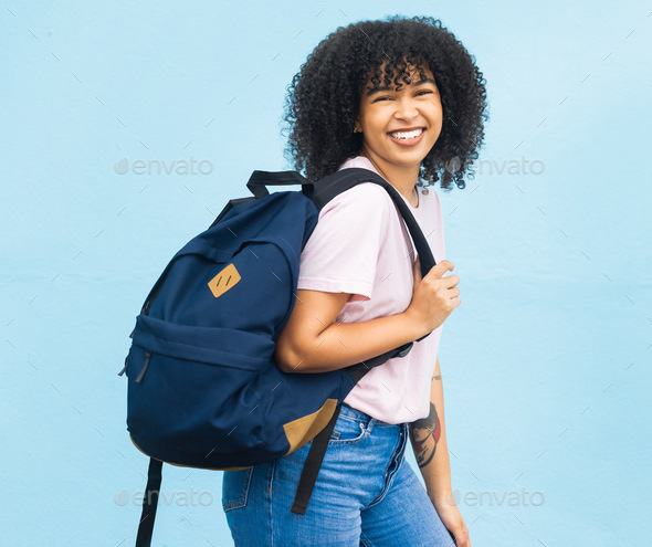 Portrait, student and black woman with backpack on blue background for ...