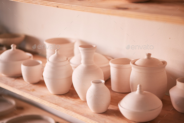 Pottery backgrounds, creativity and shelf in studio, creative store or ...