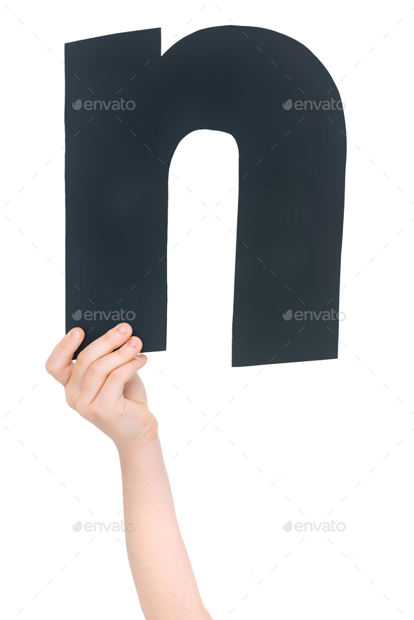 Kid holding colorful alphabet letter N in hand isolated, alphabet ...