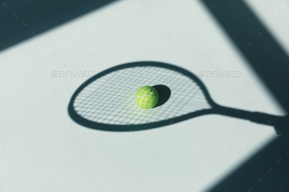 tennis racket and ball on the floor at room with daylight Stock Photo ...