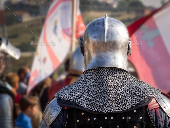 Back view of a medieval knight on a recreation event Stock Photo by ...