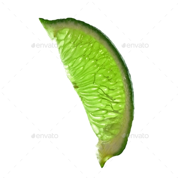 Closeup shot of a visible pulp of a green lime fruit in a white ...