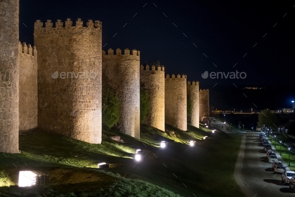 Stone walls of Avila castle in Avila, Spain Stock Photo by wirestock