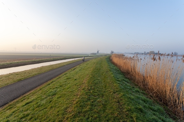 Scenery of a Dutch polder landscape under the clear sky Stock Photo by ...