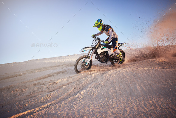 Moto cross, Dubai desert or man on bike stop for sport workout, sunset ...