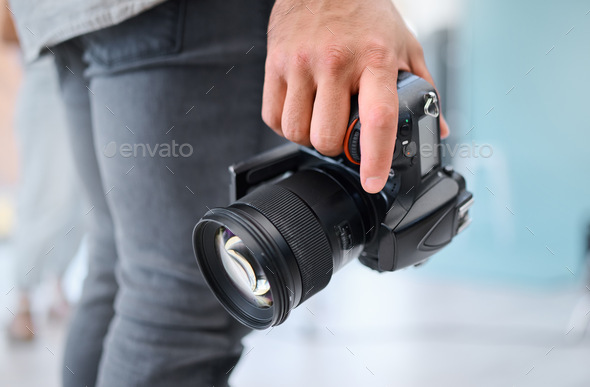 Digital photography, camera and hands of photographer in studio ...