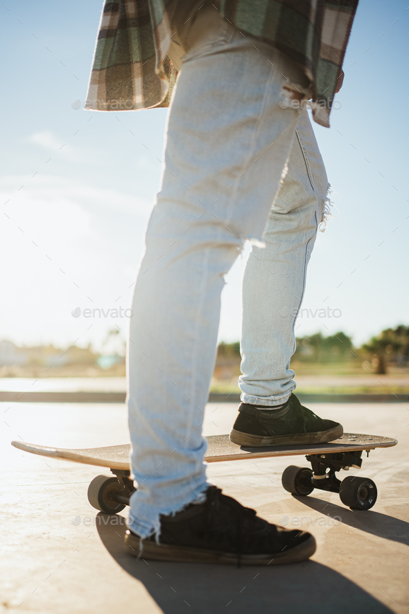 Skater's feet on skateboard Stock Photo by pablorasero | PhotoDune