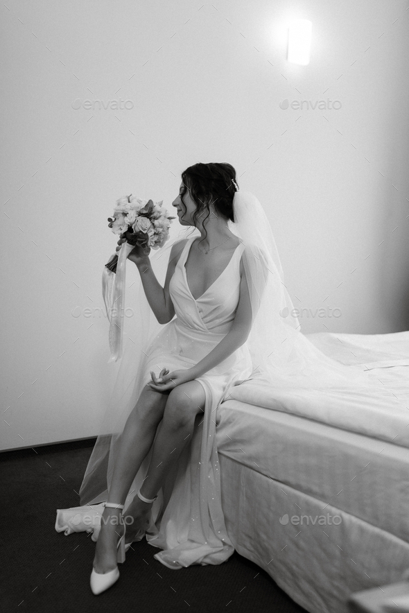 preparations for the bride with the dressing of the wedding dress Stock ...