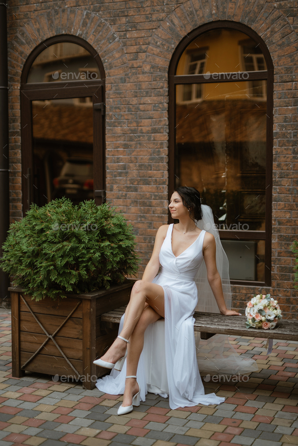 preparations for the bride with the dressing of the wedding dress Stock ...