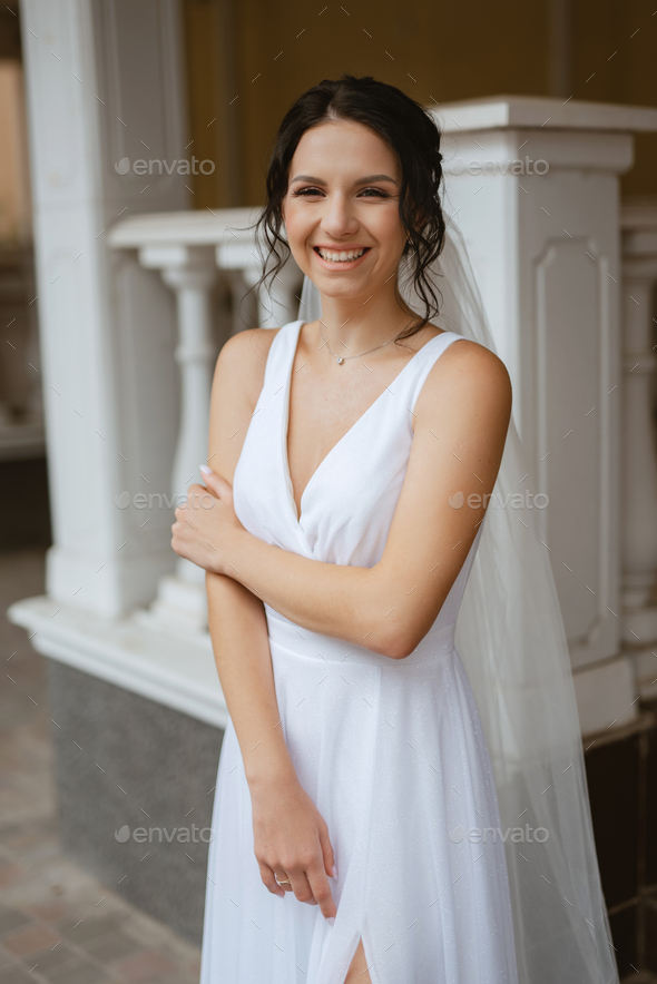 preparations for the bride with the dressing of the wedding dress Stock ...