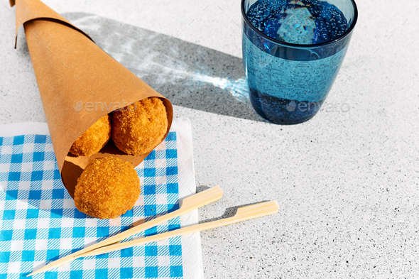 Typical Sicilian street food arancini (deep fried rice balls with meat ...