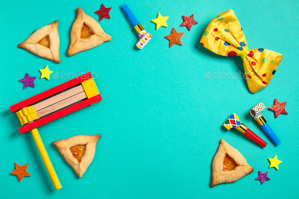 Purim carnival frame with traditional cookies, costume accessories and ...