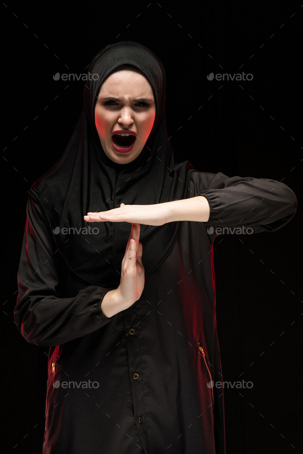 Portrait of beautiful desperate scared frightened young muslim woman ...