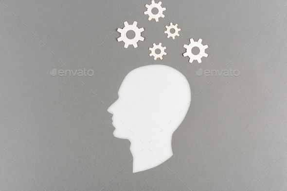 top view of cut out white human head with gears isolated on grey Stock ...