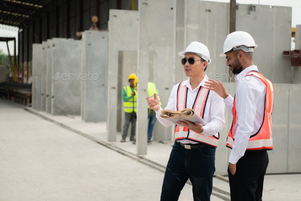 Architects a visit to the construction site Stock Photo by wosunan