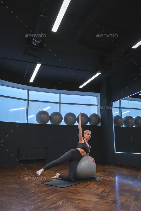 Sport.Fit Girl goes sports with fitball, fitness, pilates, meditative ...
