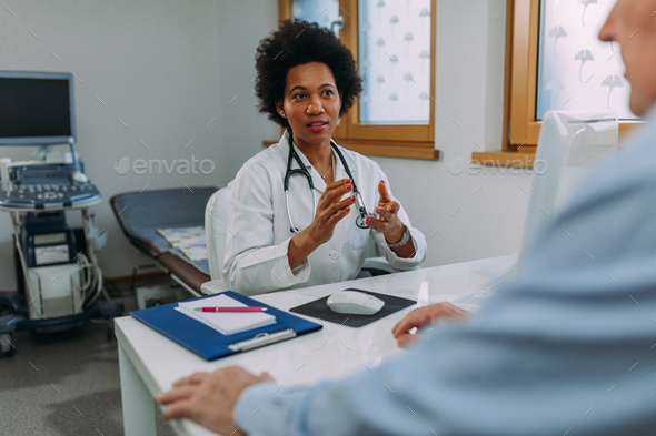 Female doctor giving advice to patient Stock Photo by bernardbodo ...