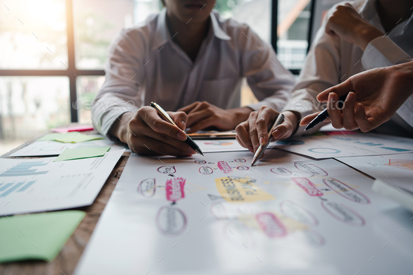 Meeting of hardworking businesspeople work together as a team by ...