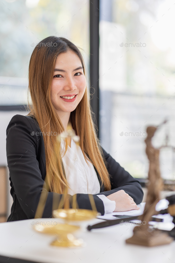 Portrait of young Asian female Lawyer or attorney working workplace office, Law, legal services ...