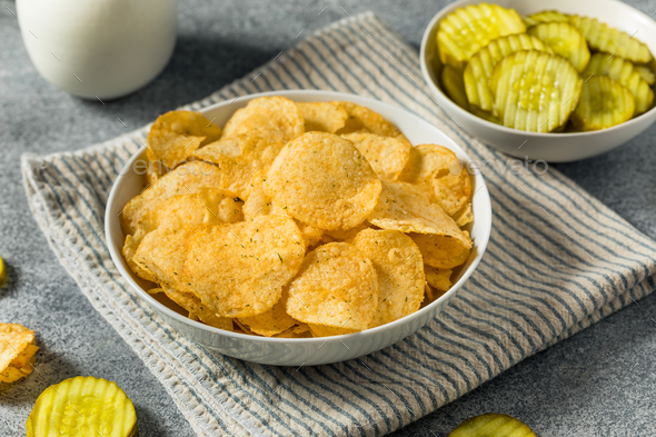 Homemade Flavored Dill Pickle Potato Chips Stock Photo by bhofack2