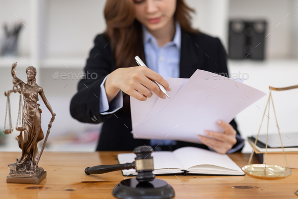 Attractive young lawyer in office Business woman and lawyers discussing ...