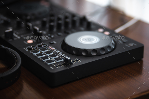 Close-up dj controller and Sound mixing desk at home Stock Photo by ...