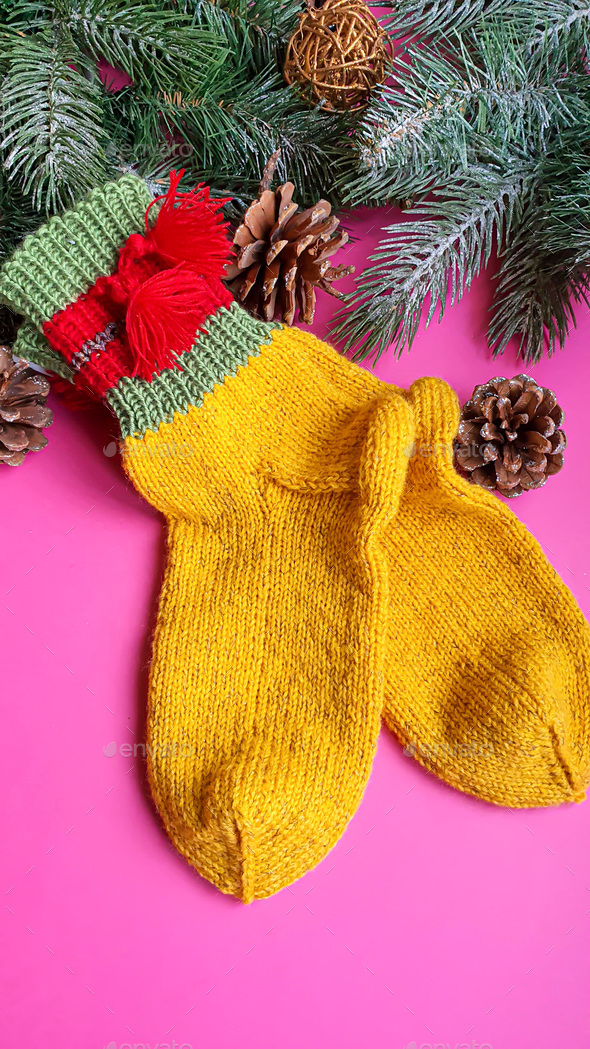 Knitted handmade items. Knitted fabric from colored thread. Bright ...