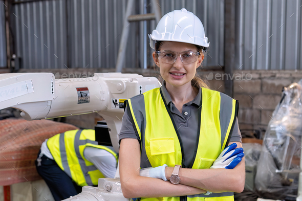 Maintenance shop engineer commissioning and operate robot arm after ...