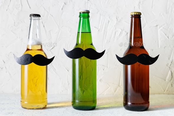 Bottle of beer with moustache. Movember. Concept of father's day ...