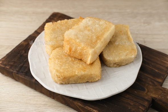 Jadah Goreng or Fried sticky rice cake Stock Photo by tyasindayanti