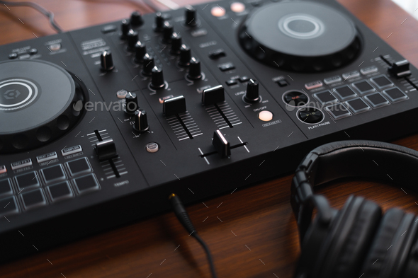 Close-up dj controller and Sound mixing desk at home Stock Photo by ...