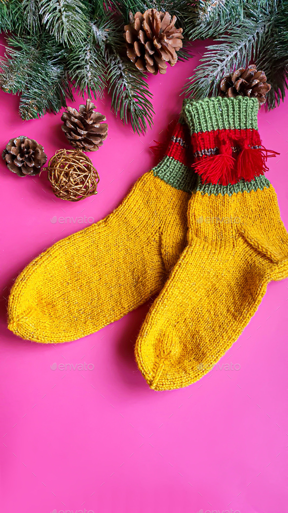 Knitted handmade items. Knitted fabric from colored thread. Bright ...