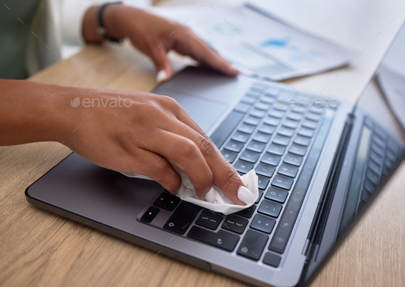 Dust, cleaning and hands on laptop by woman in office, hygiene or clean ...