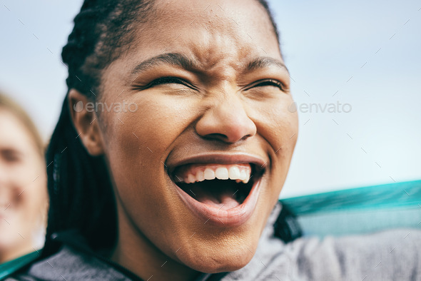 Sports, cheer and excited black woman in stadium shouting, cheering and ...